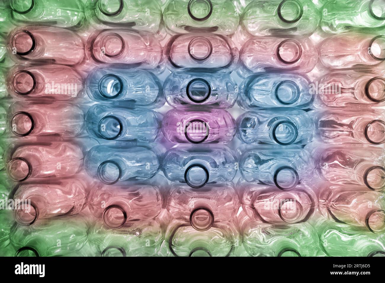 Large group of empty colored recycled glass bottles Stock Photo - Alamy
