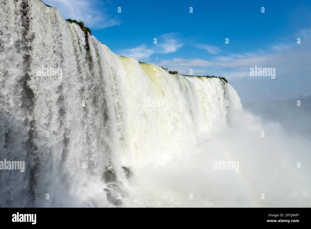 Cataratas waterfalls view from the bottom with some rocks covered by ...