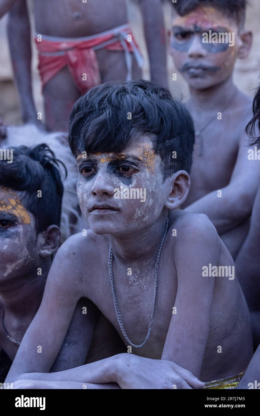 Masan Holi, Portrait of an male artist with painted face act as lord ...