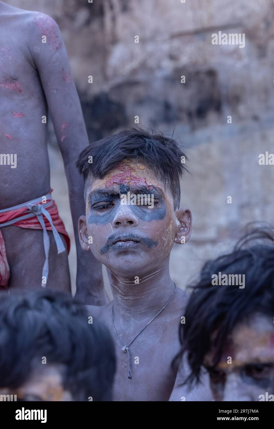 Masan Holi, Portrait of an male artist with painted face act as lord ...