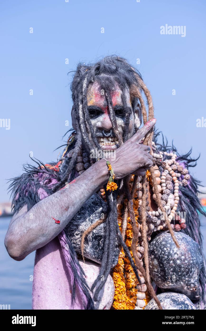 Masan Holi, Portrait of an male artist with painted face act as lord ...