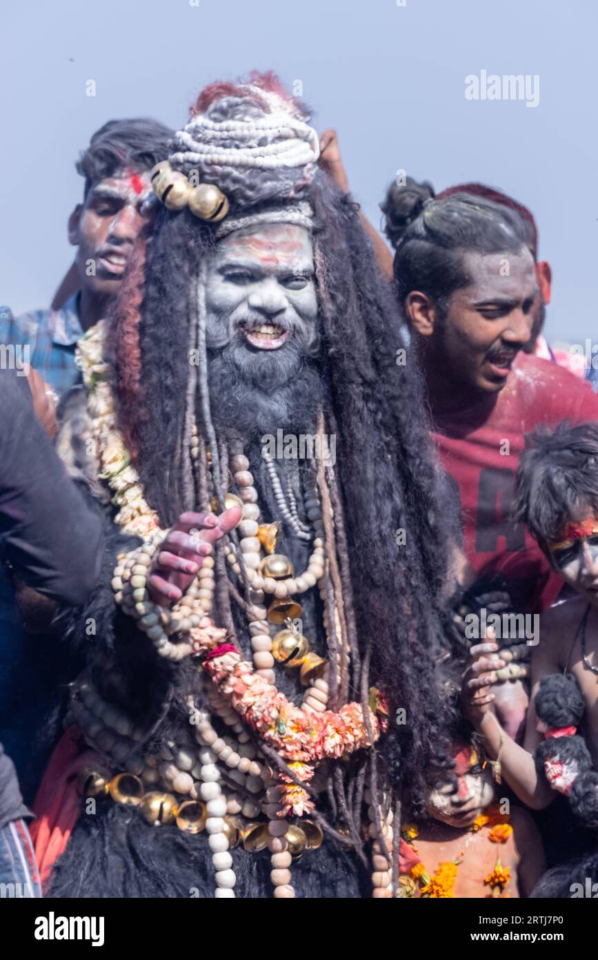 Masan Holi, Portrait of an male artist with painted face act as lord ...