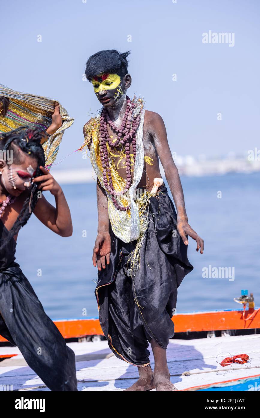 Masan Holi, Portrait of an male artist with painted face act as lord ...