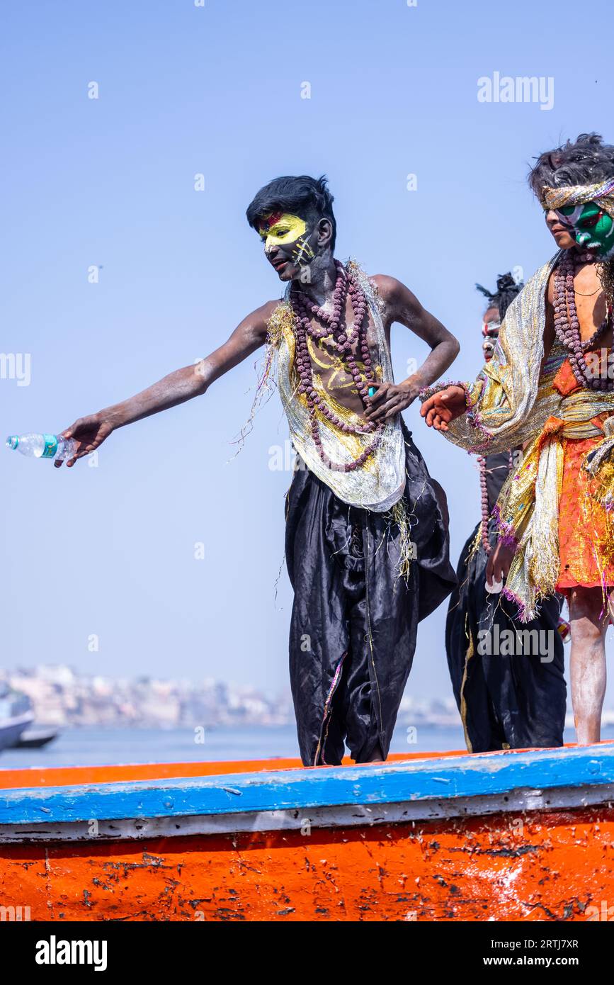 Masan Holi, Portrait of an male artist with painted face act as lord ...
