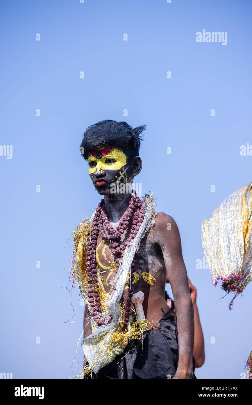 Masan Holi, Portrait of an male artist with painted face act as lord ...