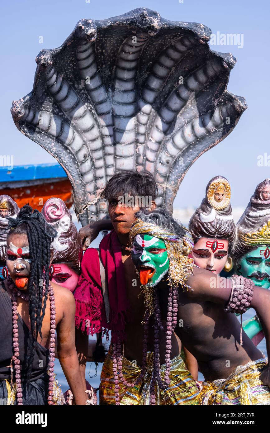 Masan Holi, Portrait of an male artist with painted face act as lord ...