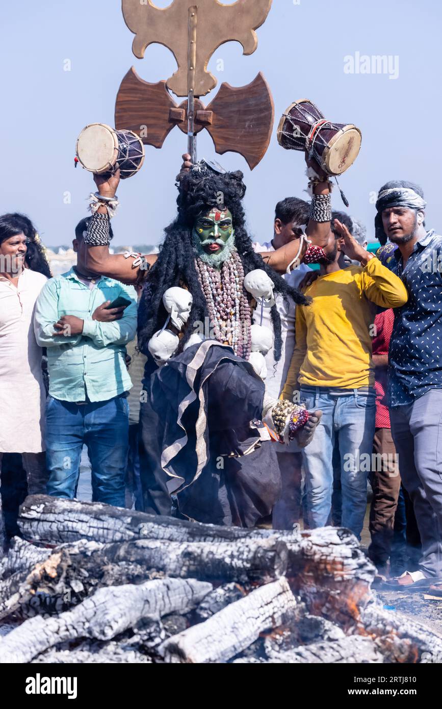 Masan Holi, Portrait of an male artist with painted face act as lord ...