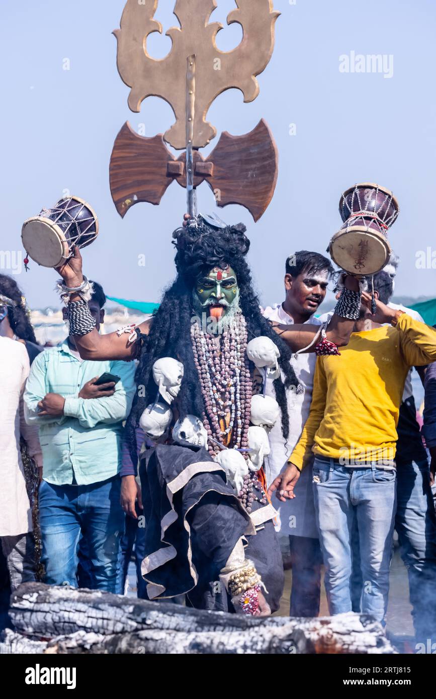 Masan Holi, Portrait of an male artist with painted face act as lord ...