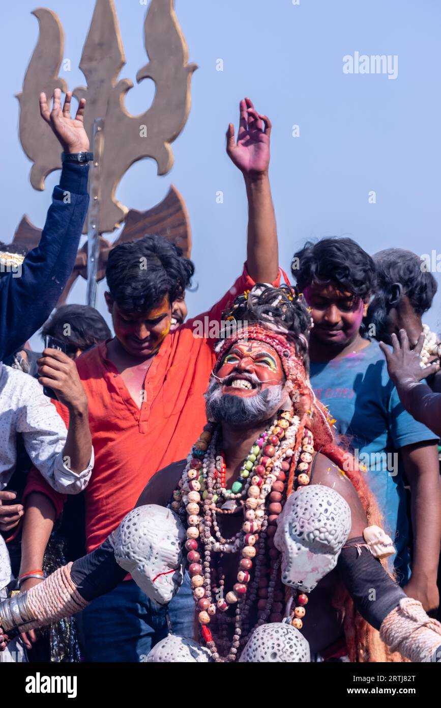 Masan Holi, Portrait of an male artist with painted face act as lord ...