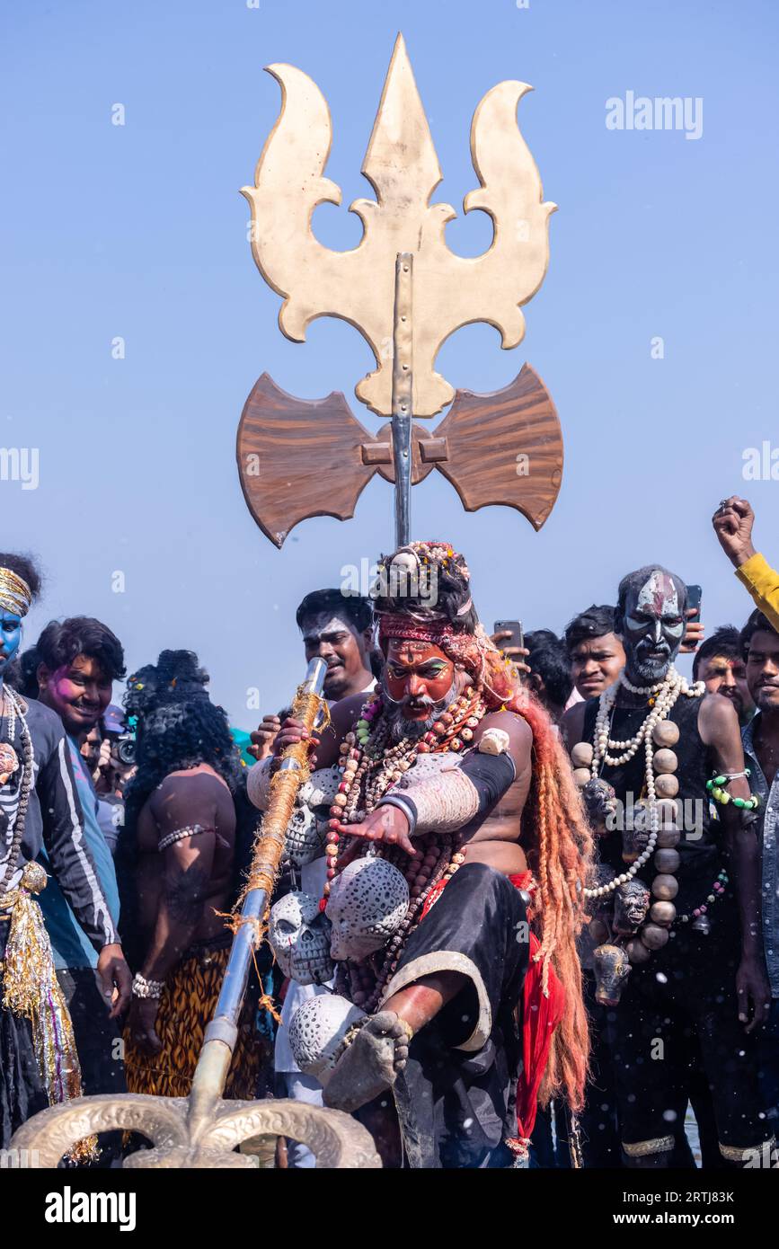 Masan Holi, Portrait of an male artist with painted face act as lord ...