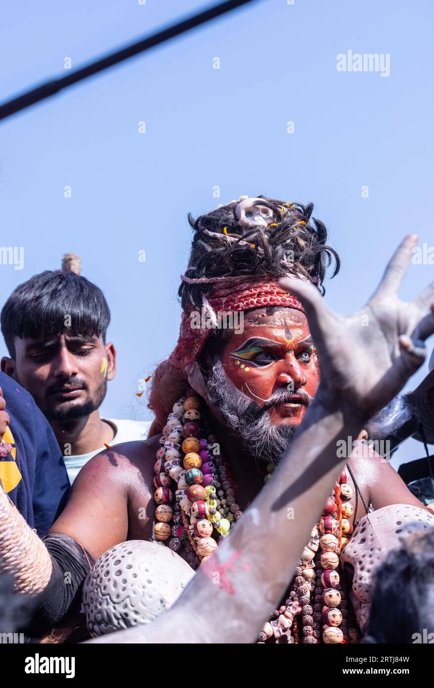 Masan Holi, Portrait of an male artist with painted face act as lord ...