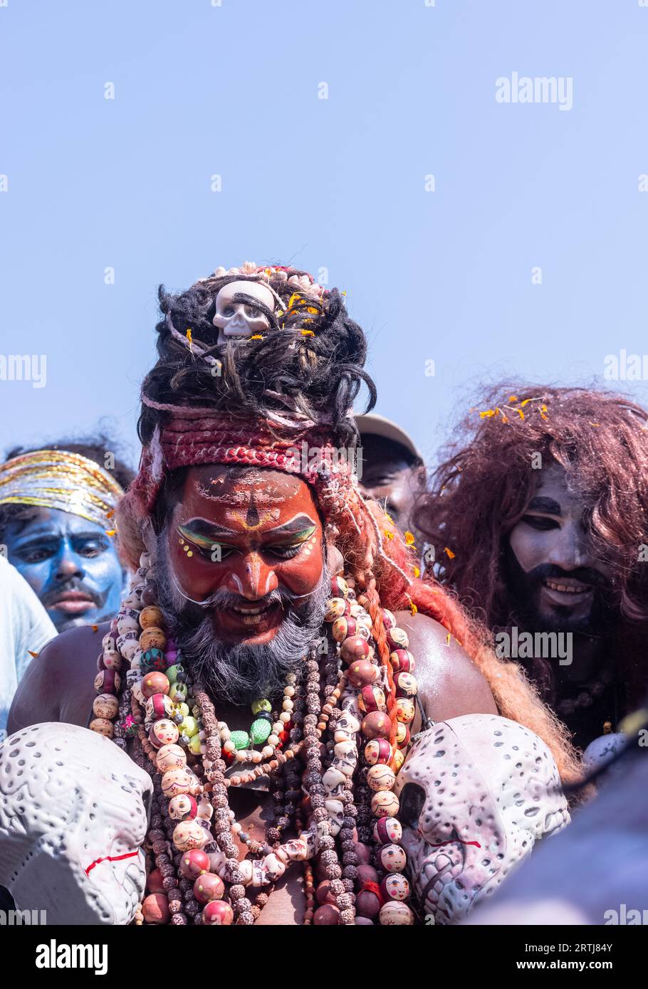 Masan Holi, Portrait of an male artist with painted face act as lord ...
