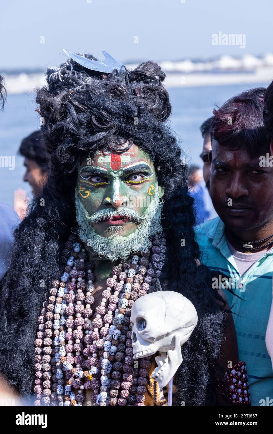 Masan Holi, Portrait of an male artist with painted face act as lord ...