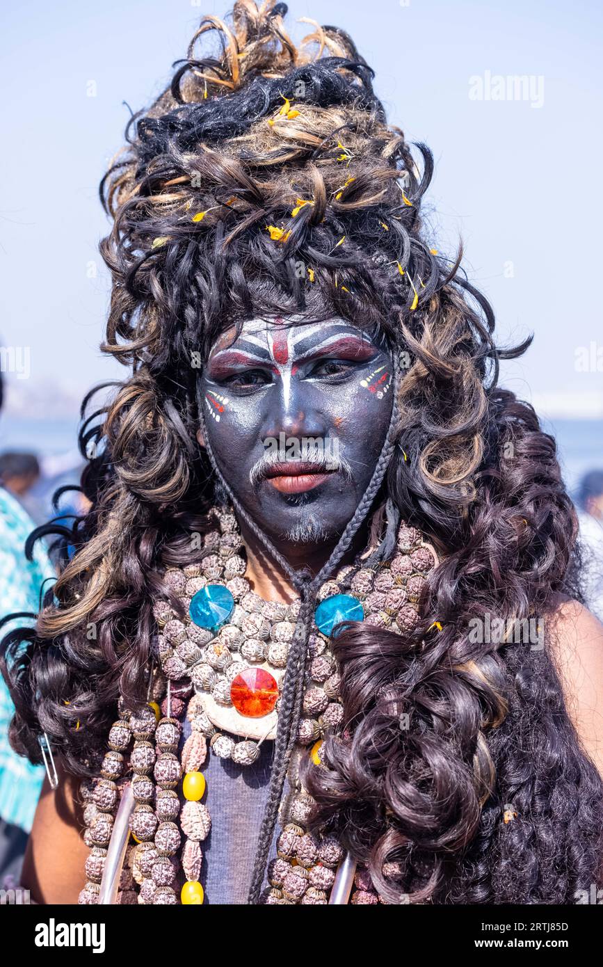 Masan Holi, Portrait of an male artist with painted face act as lord ...