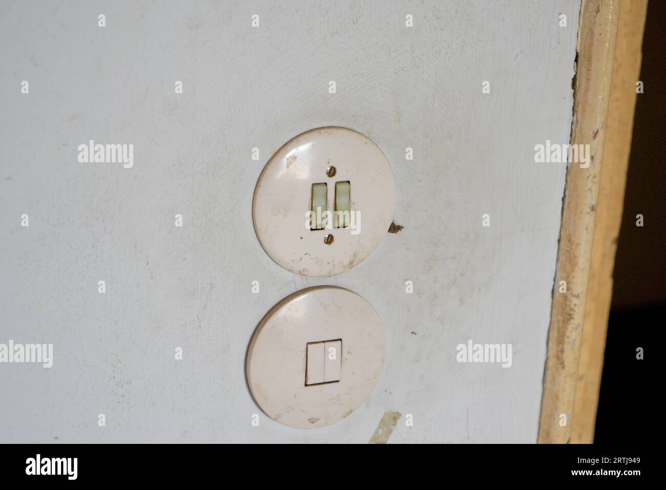 Old light switches in a lost place in a forgotten time Stock Photo - Alamy