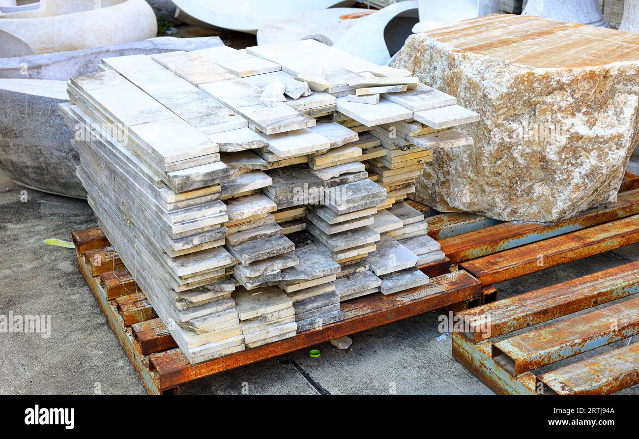 Pile or stack of marble slabs, marble tile used as materials for ...