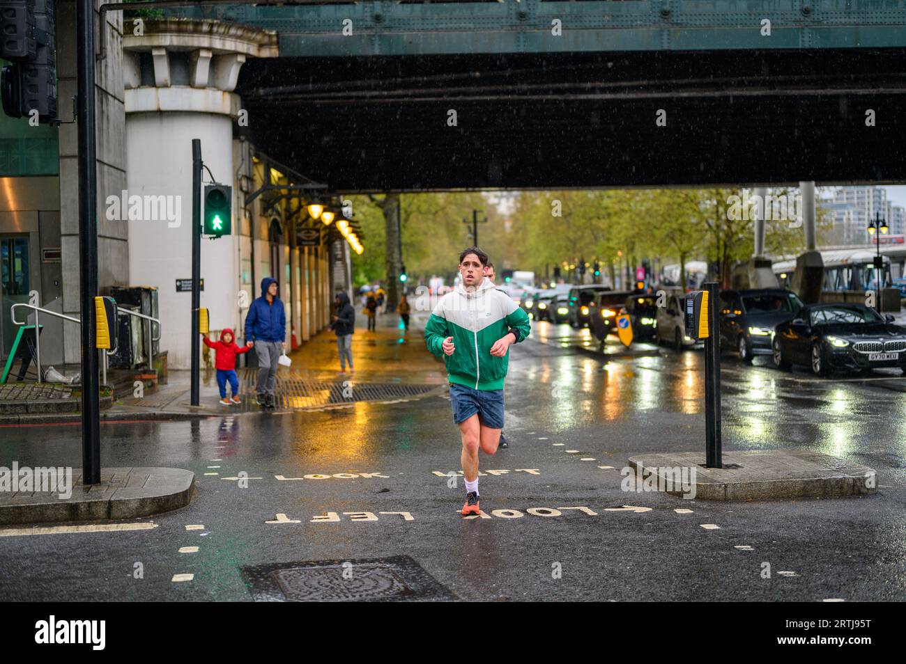 Man running in the rain hi-res stock photography and images - Alamy