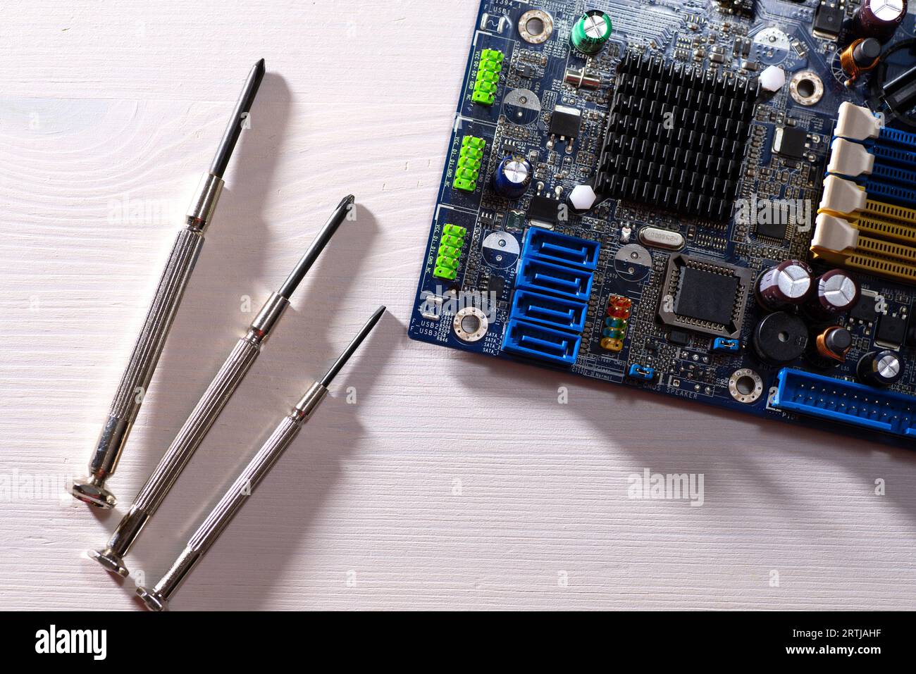 Computer repair. Motherboard repair. Motherboard and repair tools on ...
