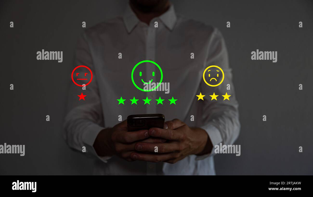 Shopper hand touching the virtual screen on the happy smile face icon ...