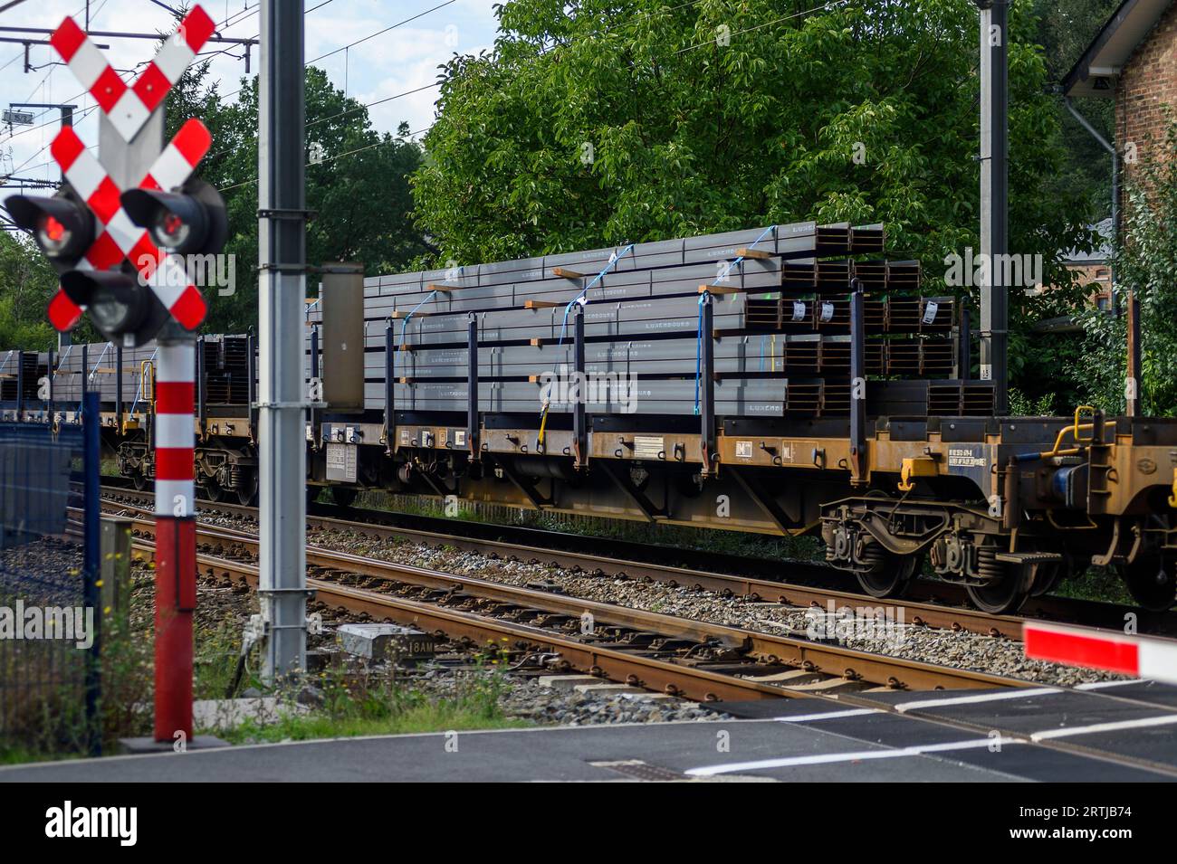 Moving freight train with carriage loaded with metal powder in the ...