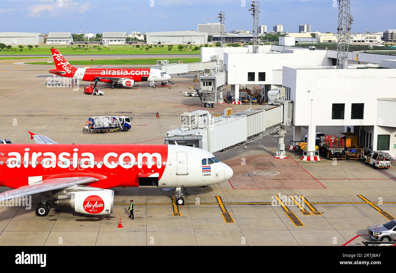 Don-Mueang Airport view, The red-white Airplane parking at passenger ...