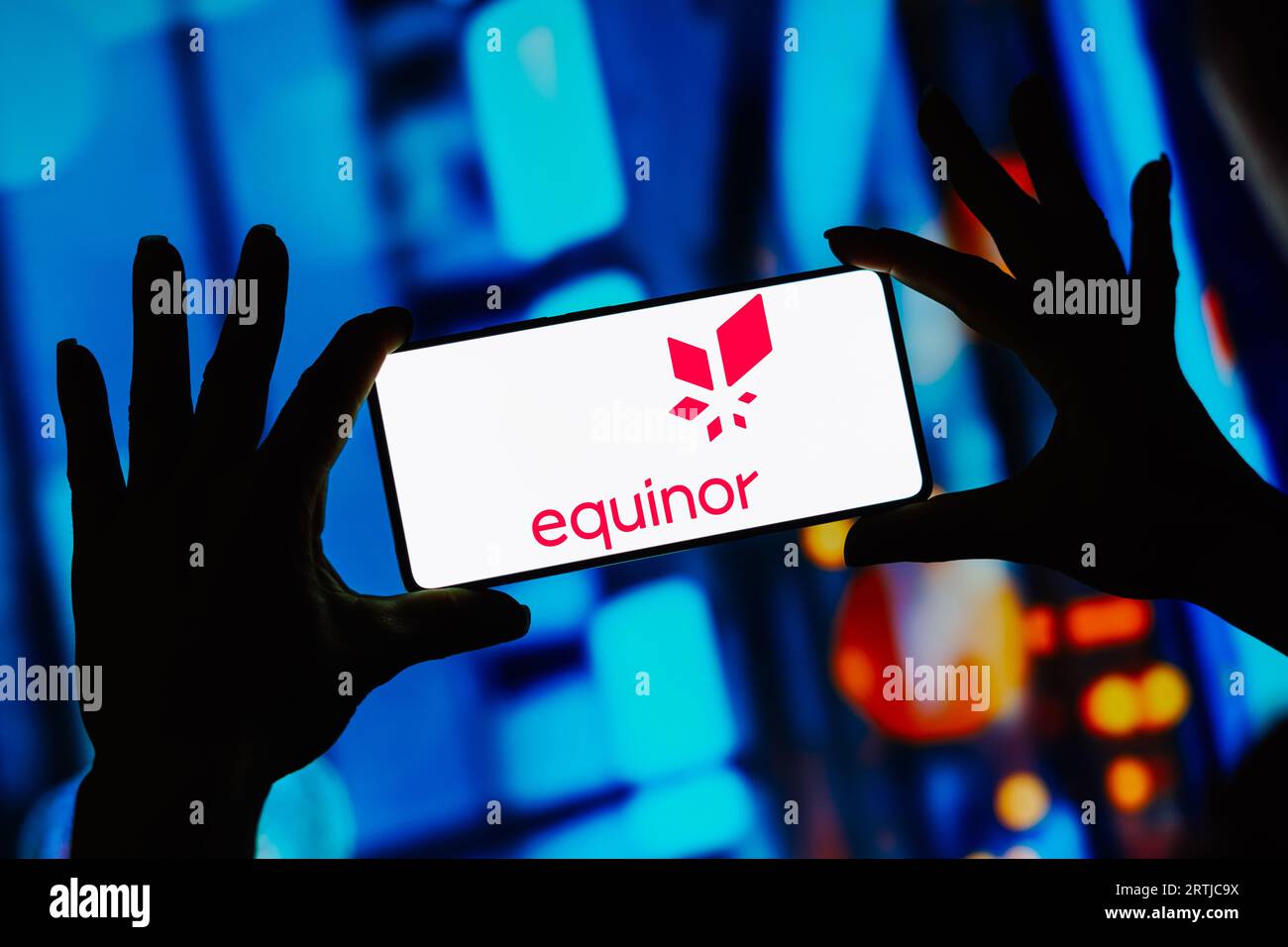 In this photo illustration, the Equinor logo is displayed on a ...