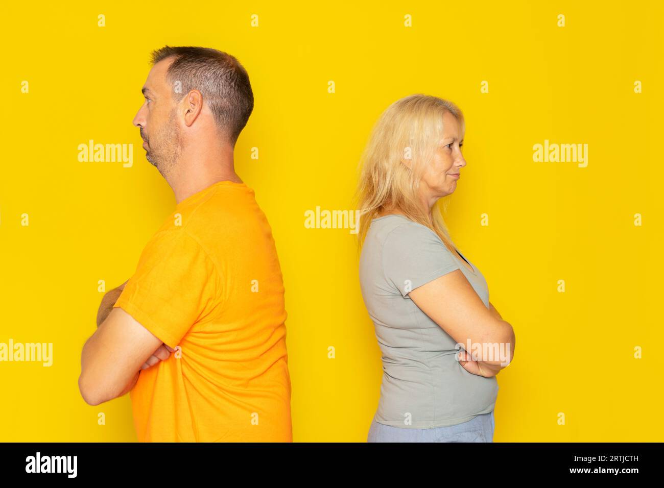 Portrait of a real Caucasian couple in their 40s having an argument ...