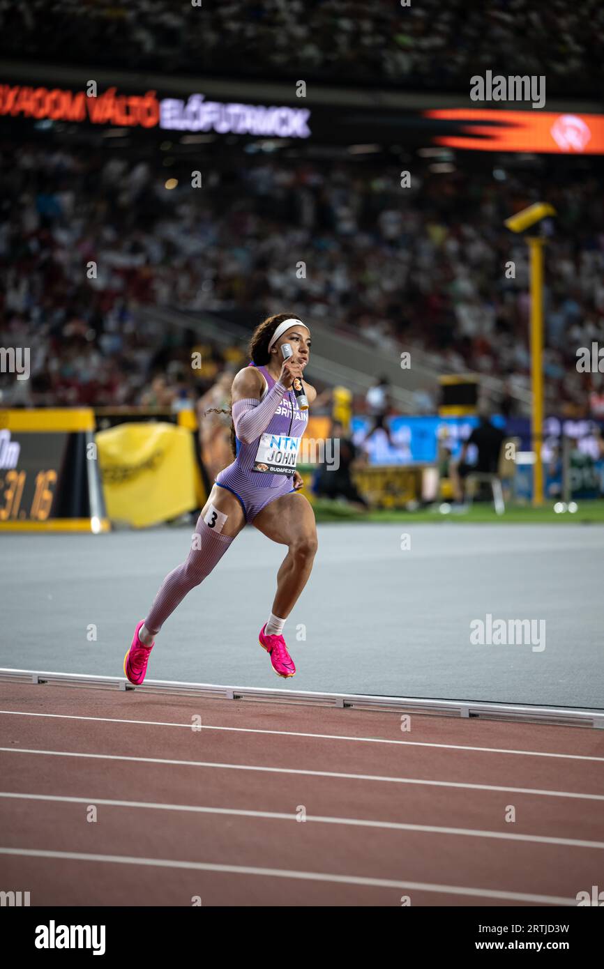 Yemi Mary John participating in the 4X400 meters relay at the World ...