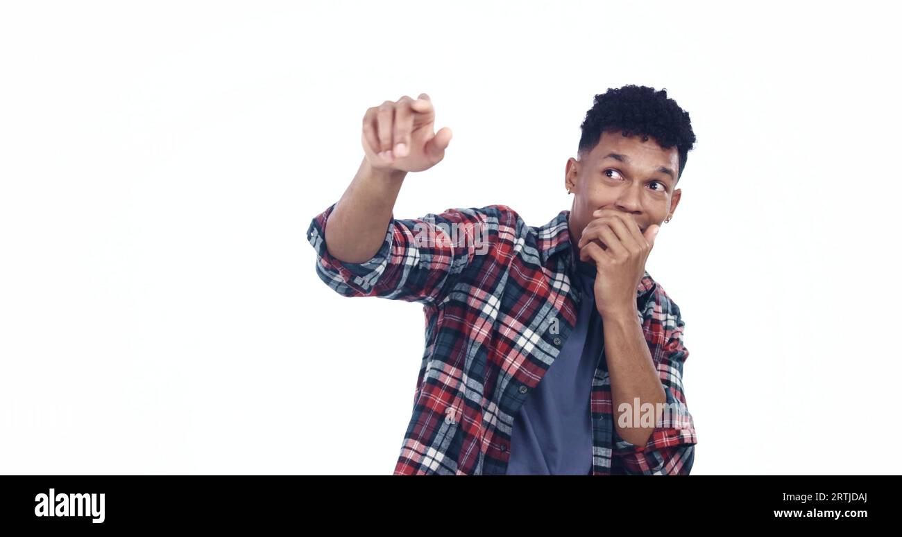 Hand pointing, mistake and scared man in studio with anxiety or mental ...