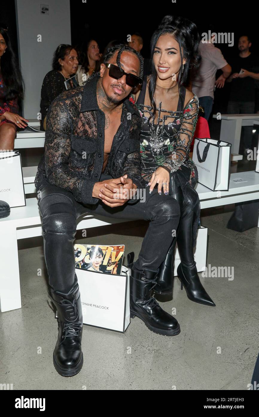 Television host Nick Cannon, left, and fashion model Bre Tiesi attend ...
