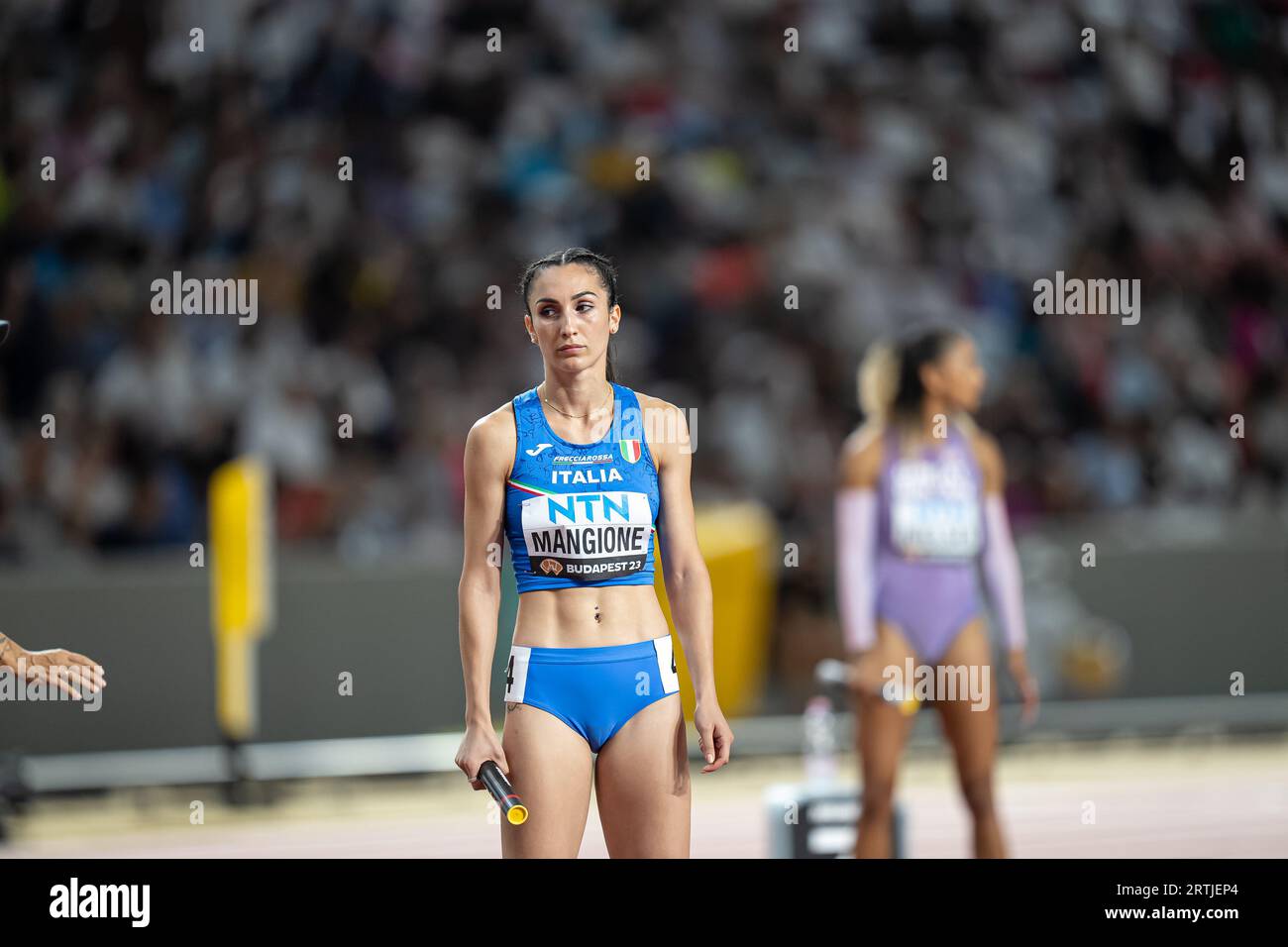 Alice Mangione participating in the 4X400 meters relay at the World ...