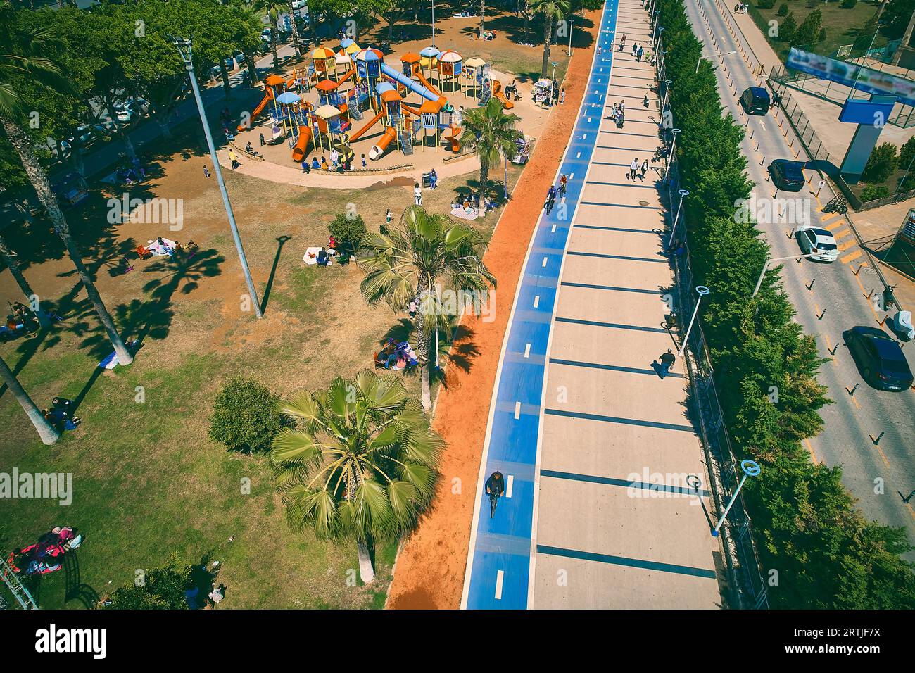Children playground, bike path and walkway on the embankment. Aerial ...