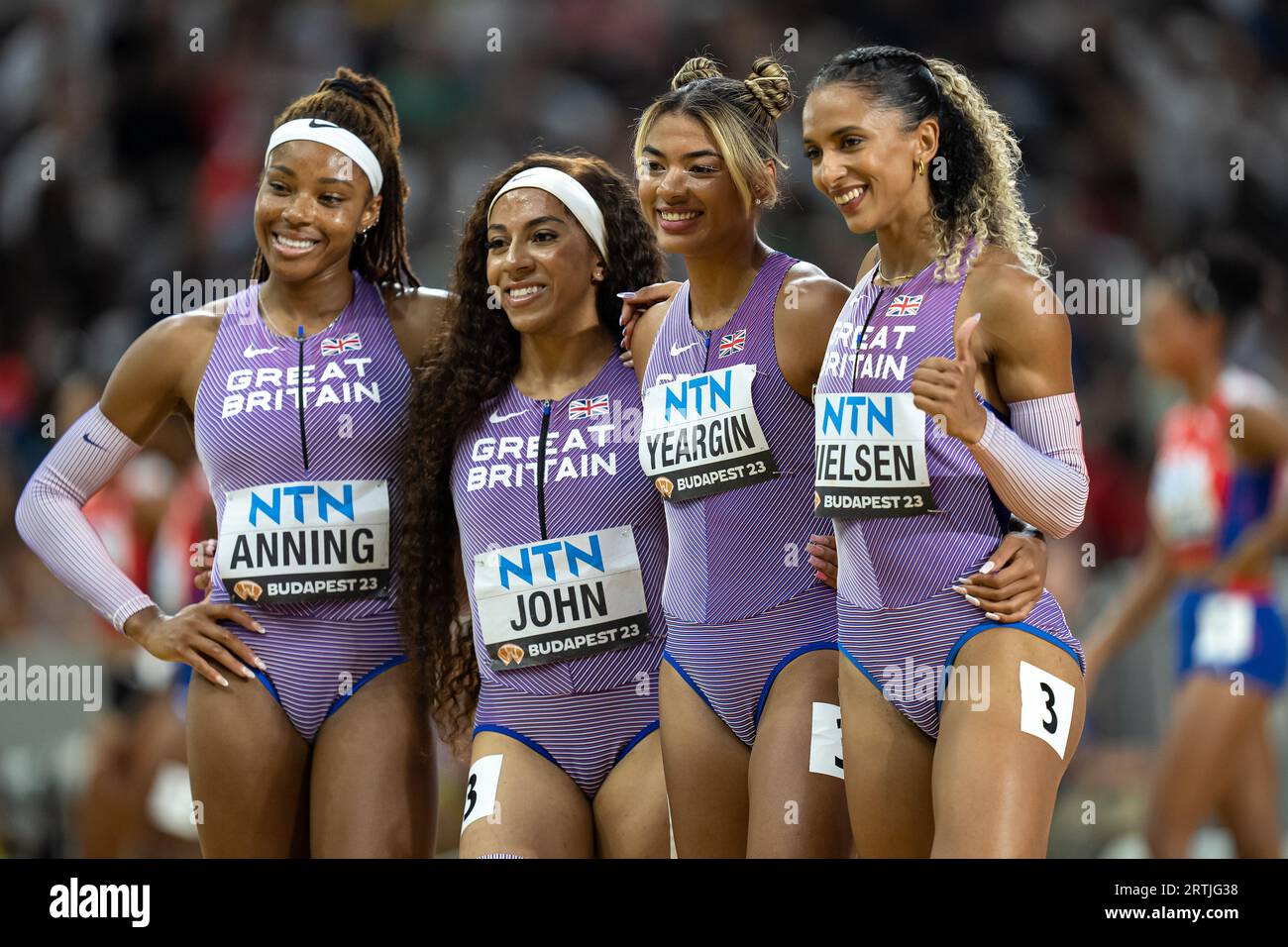 Amber Anning,Nicole Yeargin, Laviai Nielsen,Ama Pipi with her country's ...