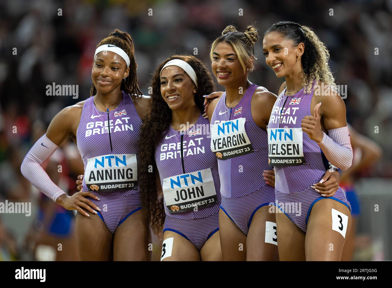 Amber Anning,Nicole Yeargin, Laviai Nielsen,Ama Pipi with her country's ...