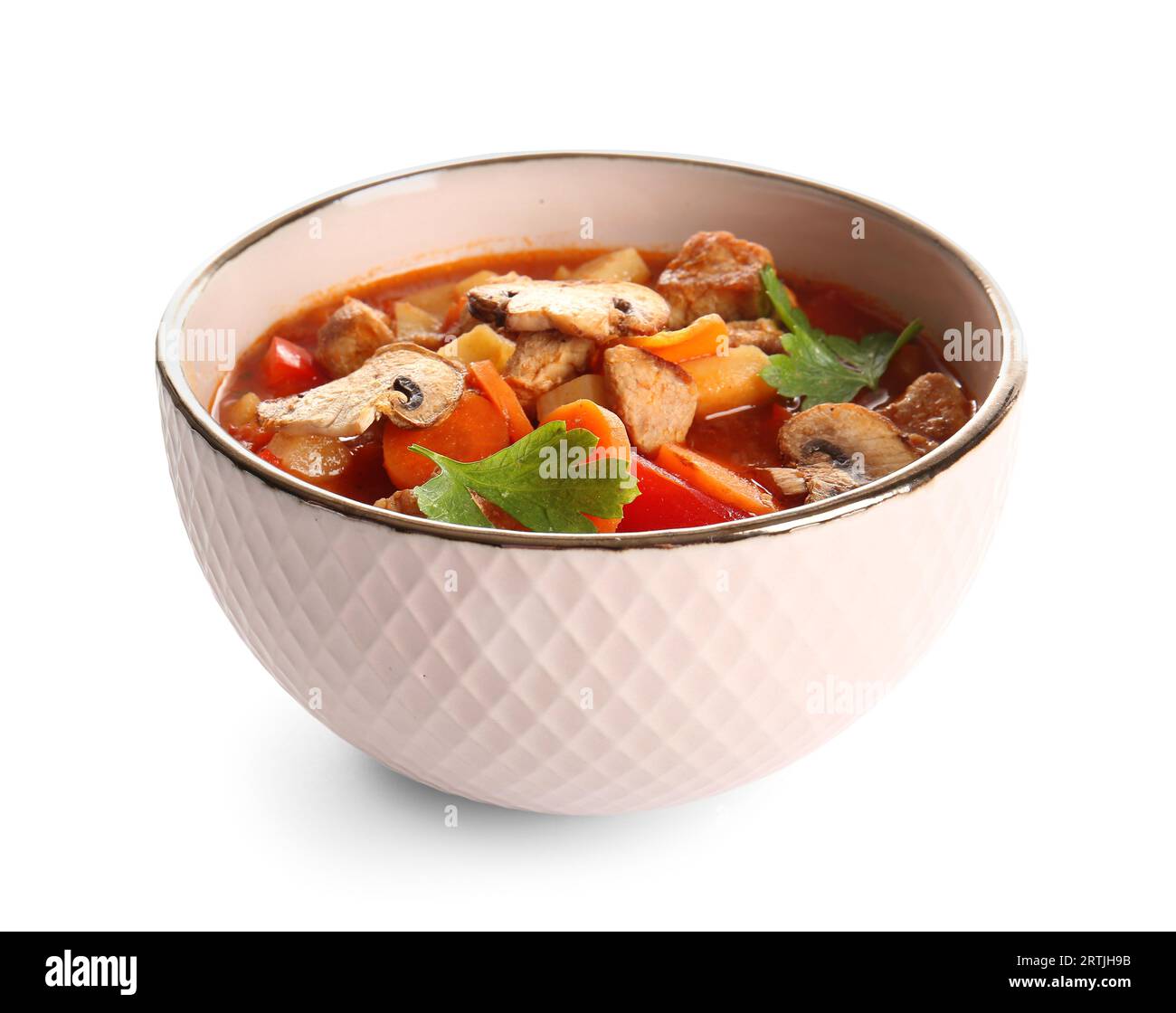Bowl of tasty beef stew on white background Stock Photo - Alamy