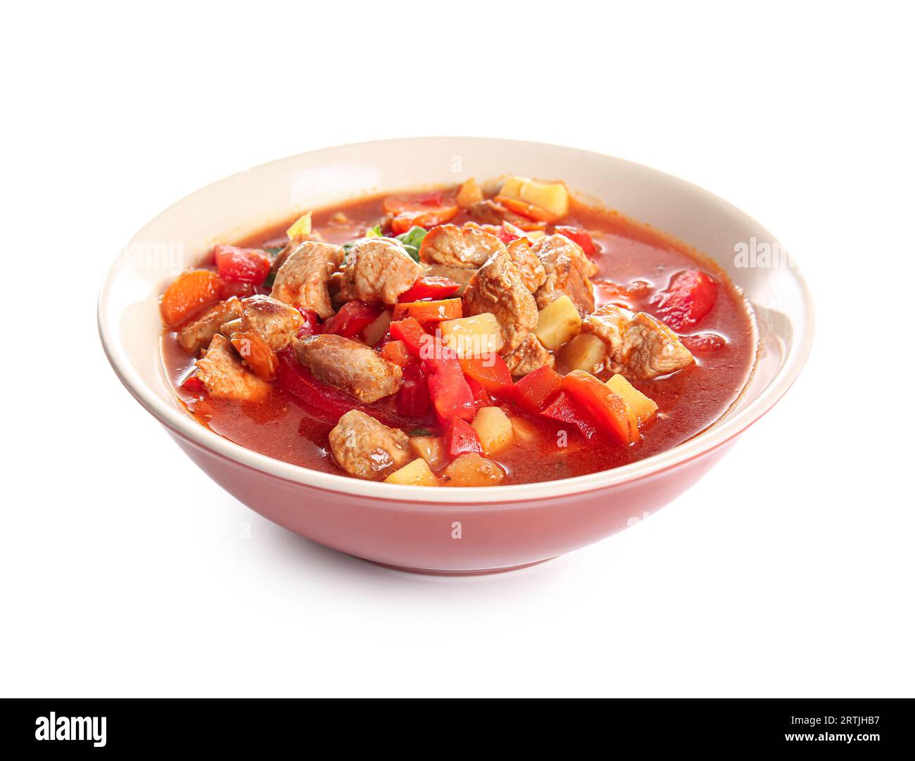 Bowl of tasty beef stew on white background Stock Photo - Alamy