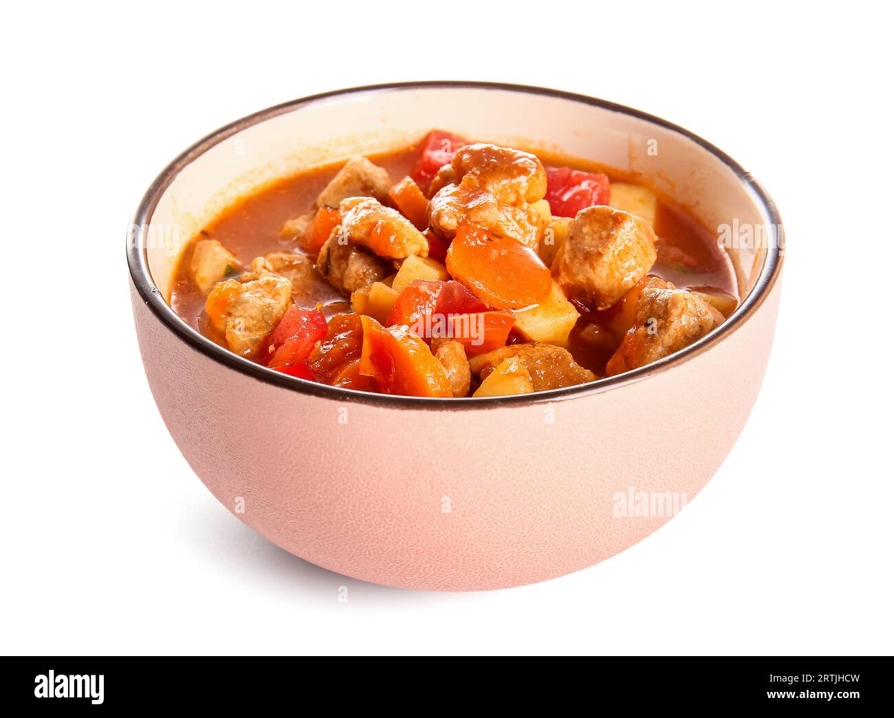 Bowl of tasty beef stew on white background Stock Photo - Alamy