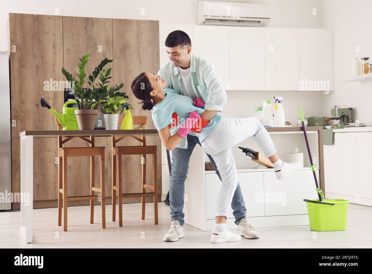 Loving asian couple cleaning hi-res stock photography and images - Alamy