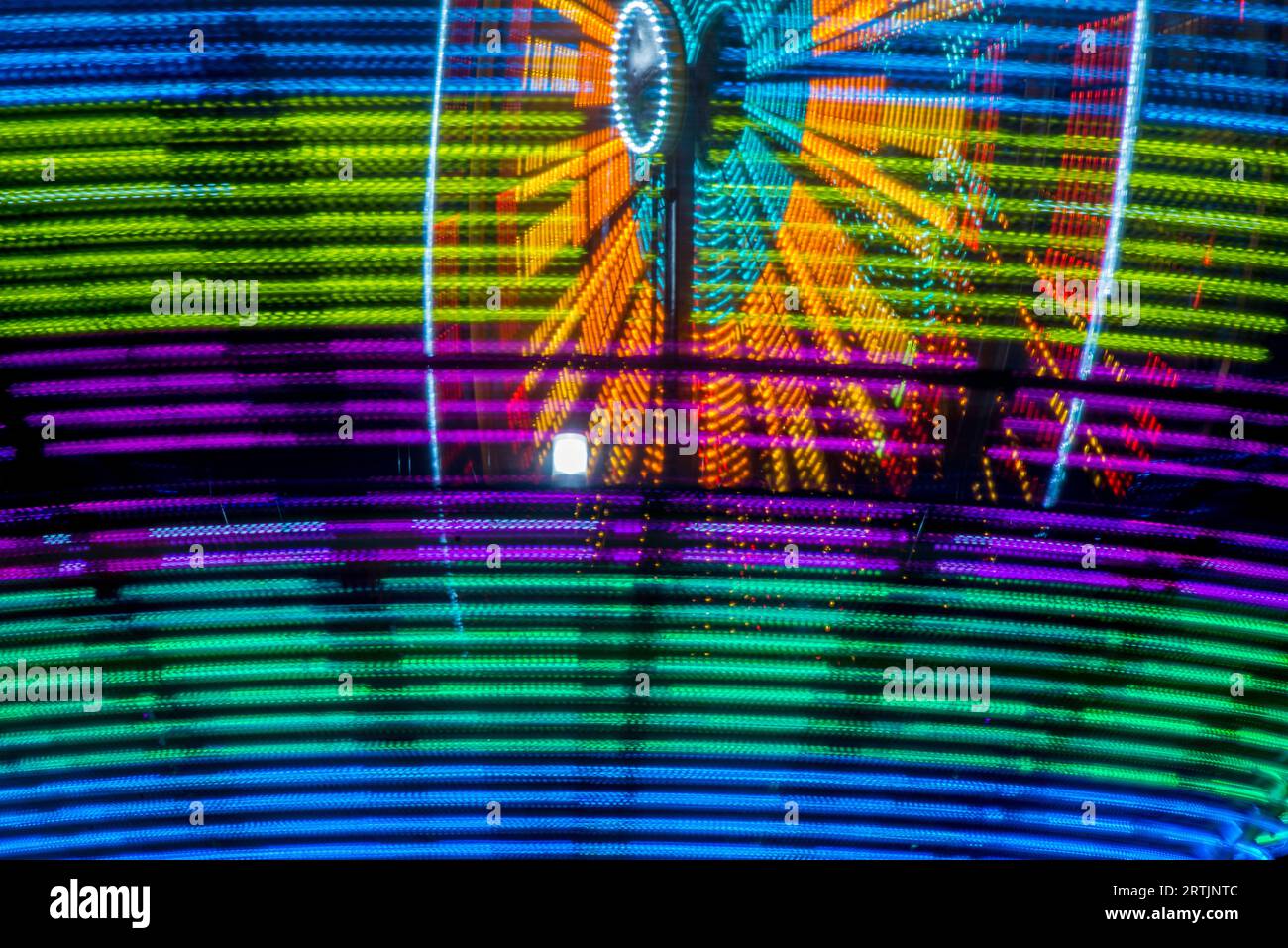 Festive rides at the county fair at night. Photo by Liz Roll Stock ...