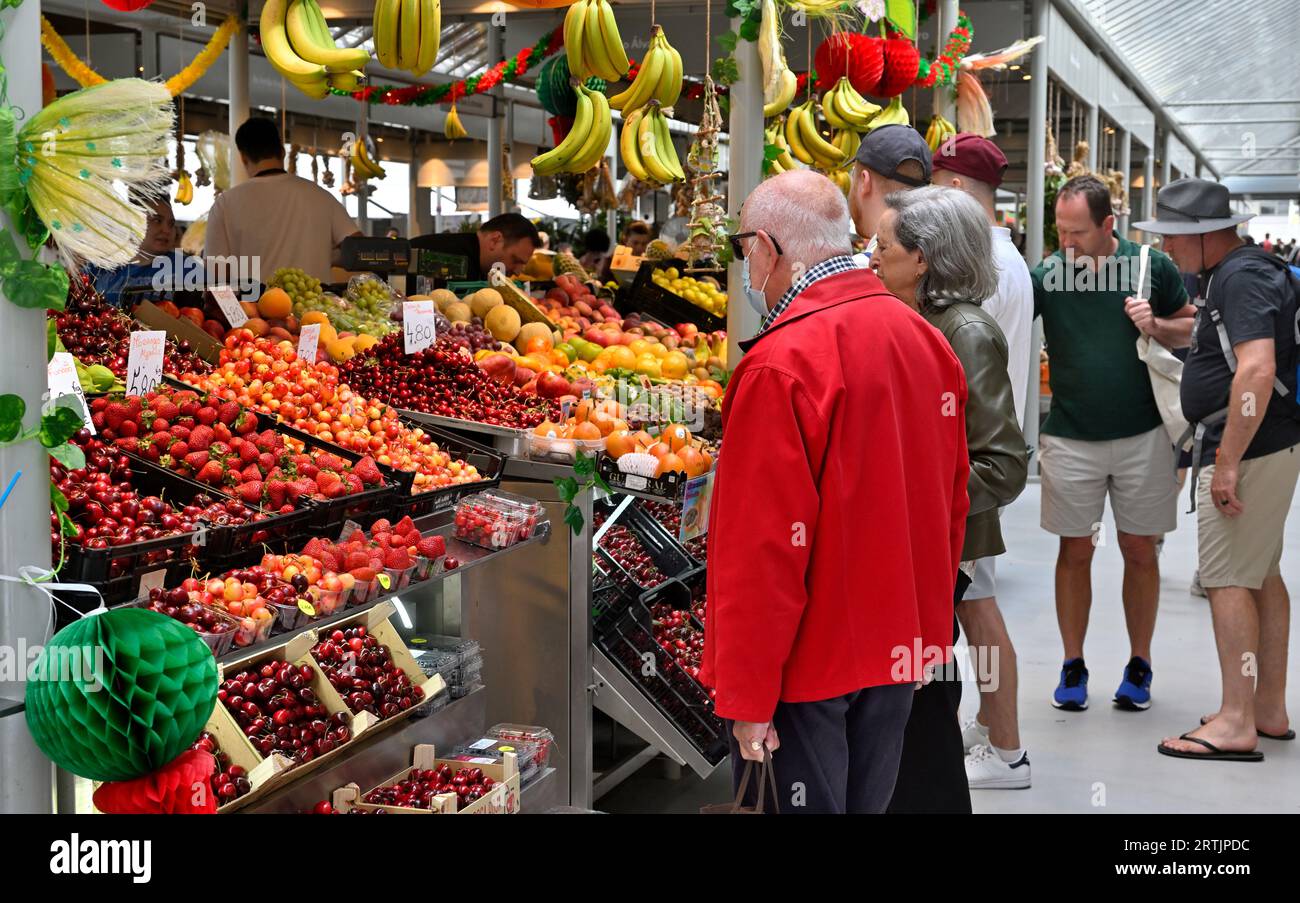 Market stall selling mix of fruit and vegetables, cherries ...