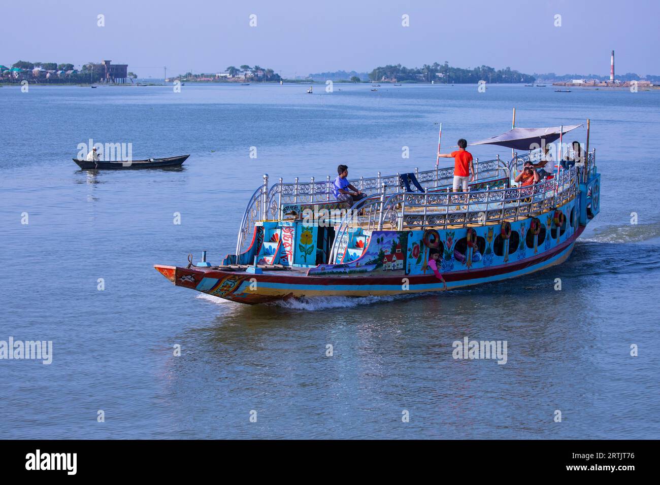 A passenger boat on the Nikli Haor at austagram in Kishorganj ...