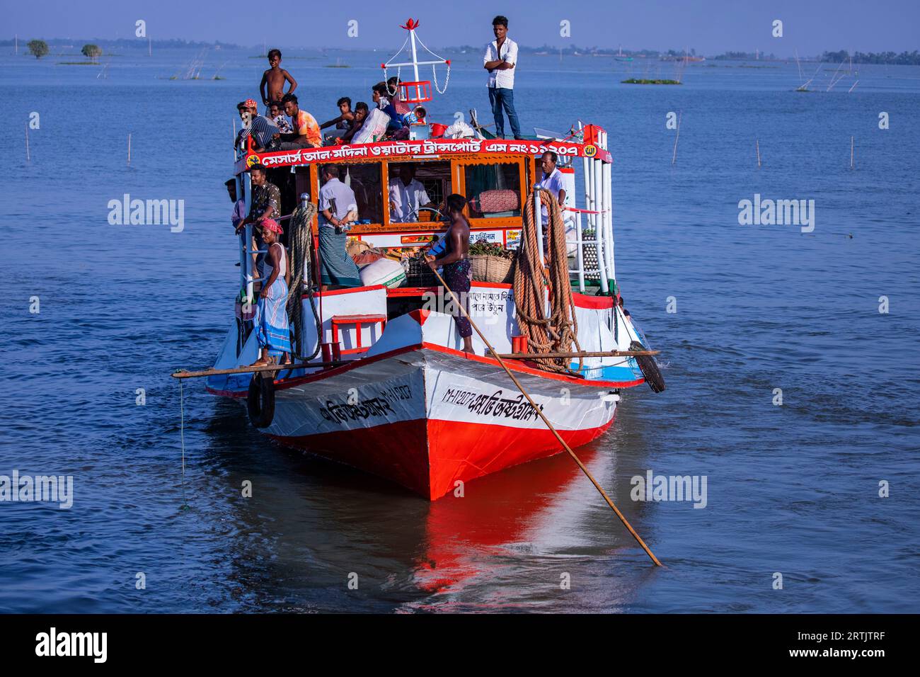 A passenger vessel on the Nikli Haor at austagram in Kishorganj ...