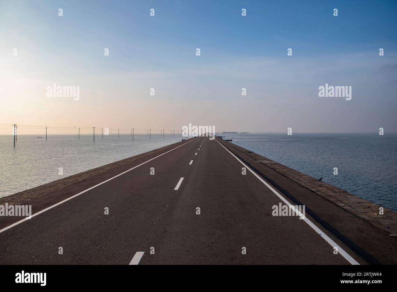 Itna-Mithamoin-Austagram all-weather road goes straight through a vast ...