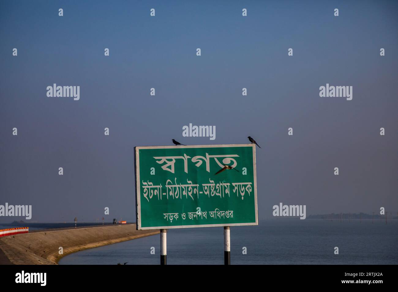 Itna-Mithamoin-Austagram all-weather road goes straight through a vast ...