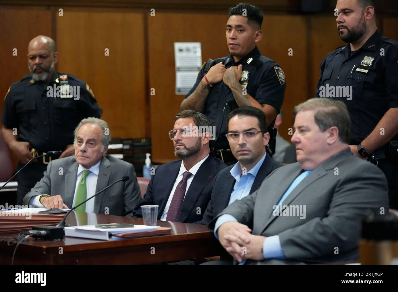 Former New York City's Buildings Commissioner Eric Ulrich, seated ...