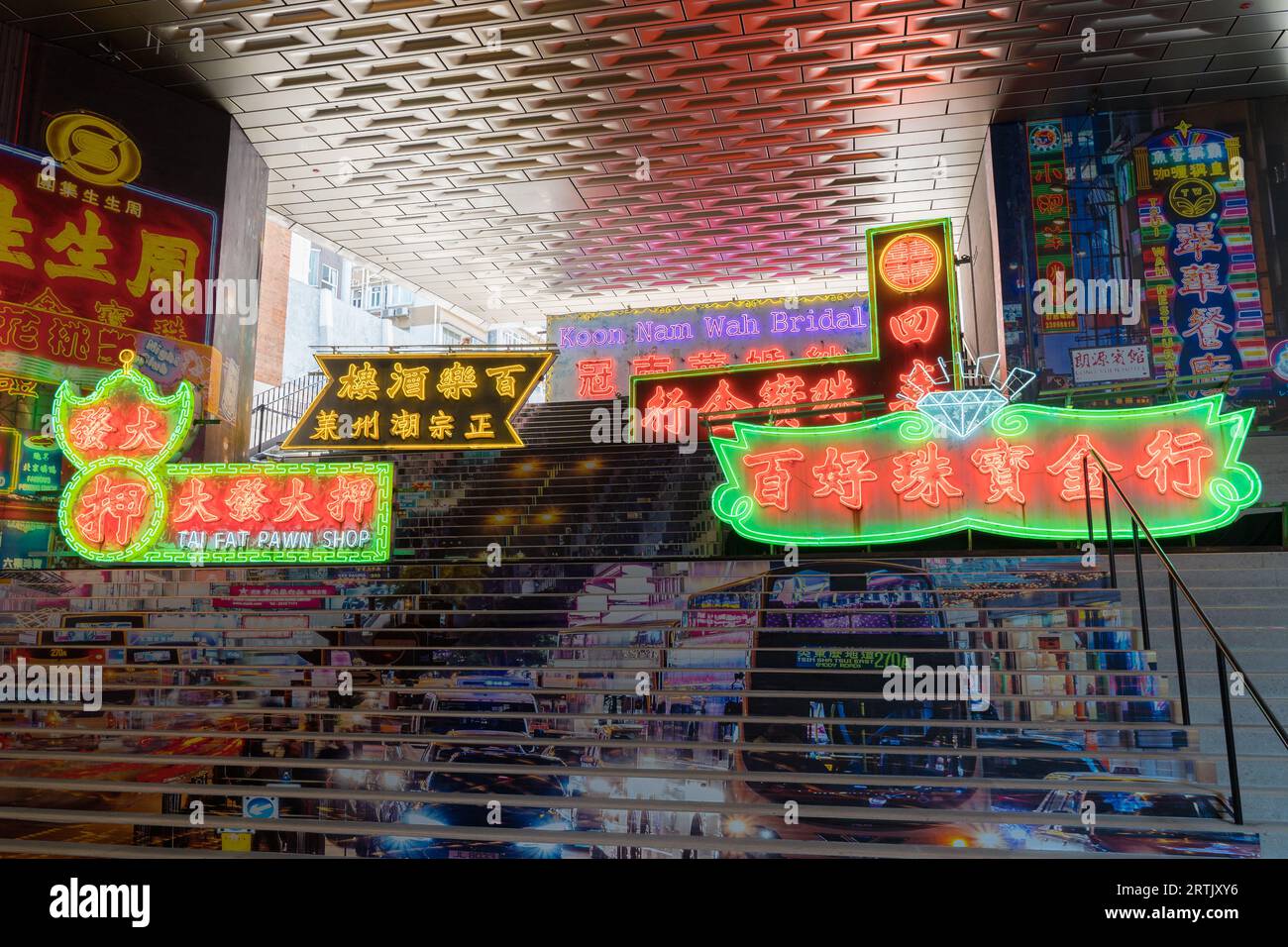 Old neon light signs displayed on some stairs after being taken down ...