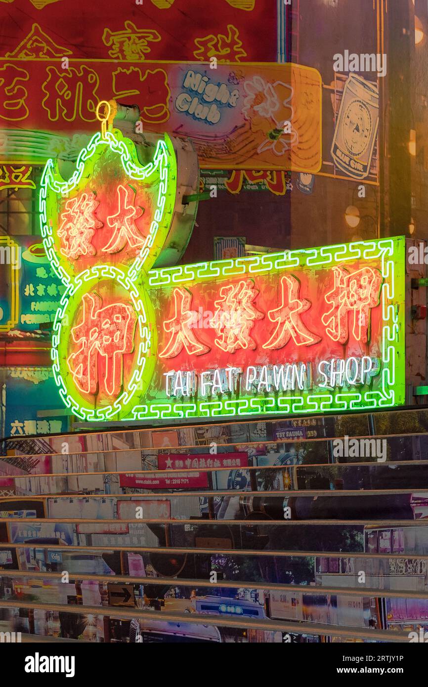 Tai Fat Pawn Shop neon light sign displayed on some stairs after being ...
