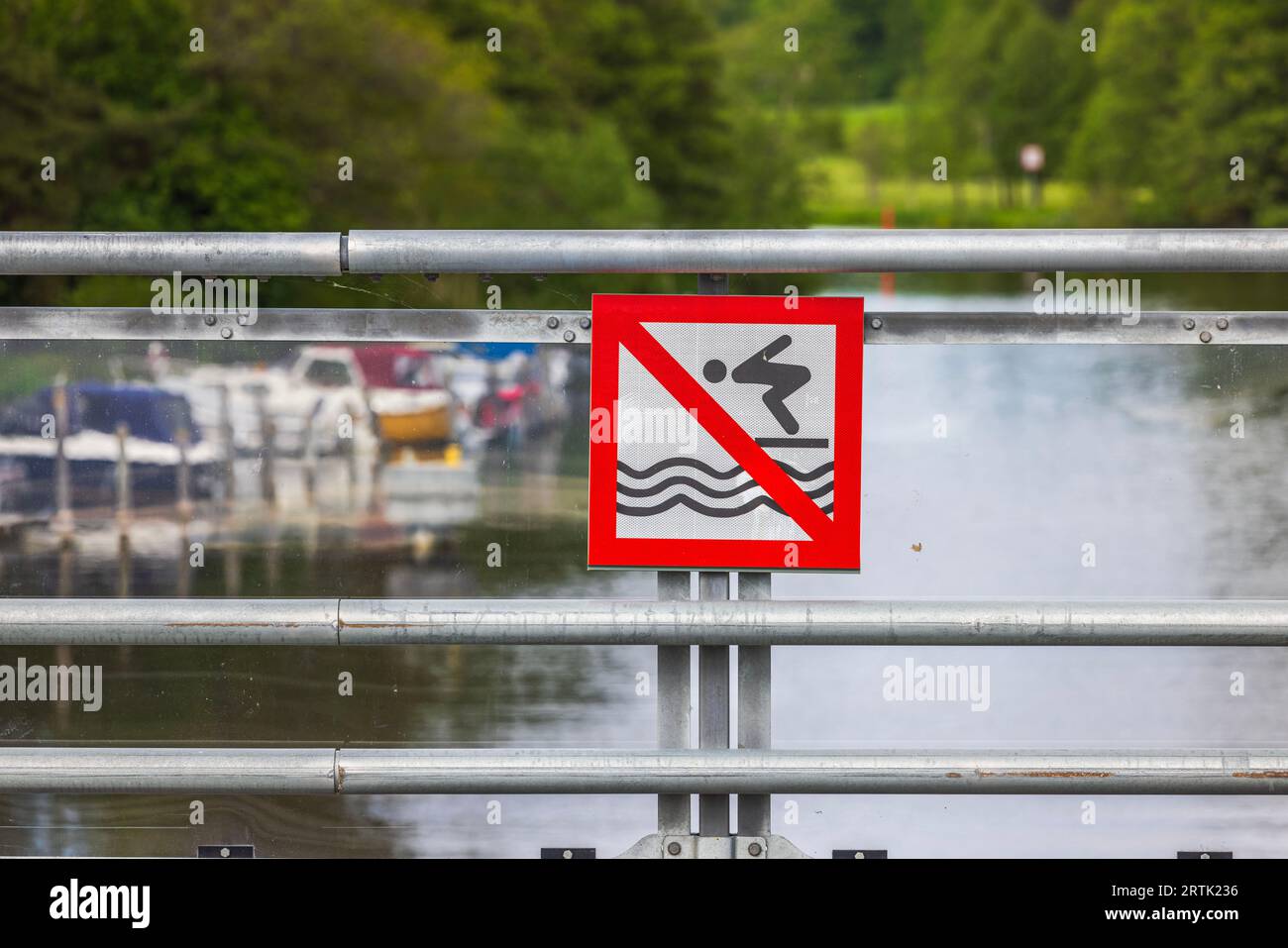 Close-up view of sign prohibited diving from bridge Stock Photo - Alamy