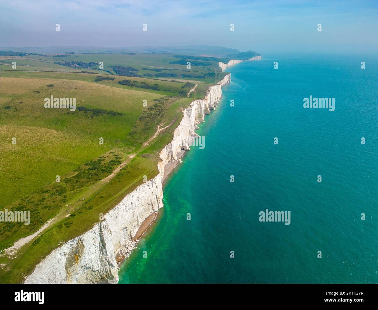 A daytime aerial drone view of the Seven Sisters cliffs on the East ...