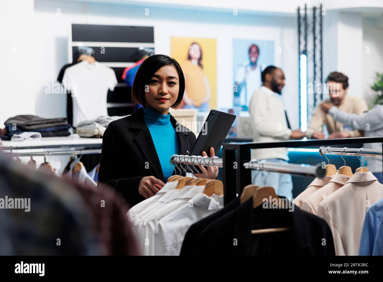 Woman holding tablet exploring stock hi-res stock photography and ...